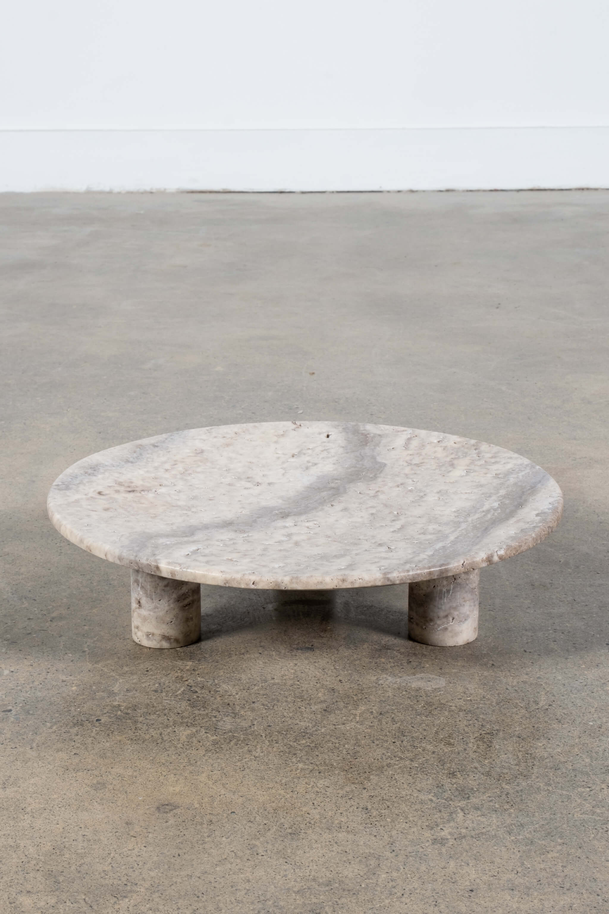 Round Footed Plate in Grey Travertine | Bonne Choice